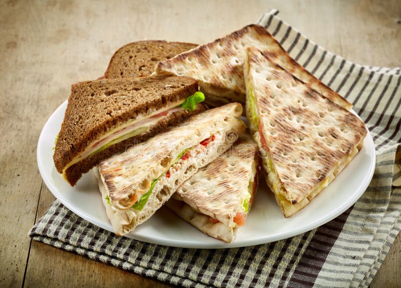 Various Triangle Sandwiches on Wooden Board Stock Image - Image of ...