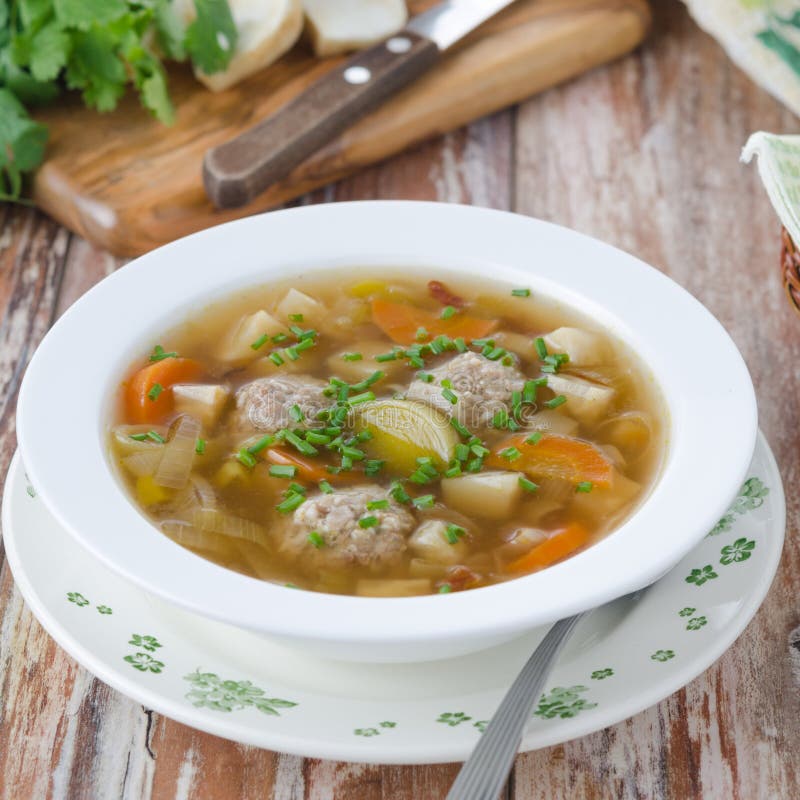 Plate of Vegetable Soup with Meatballs on the Wooden Table Stock Photo ...