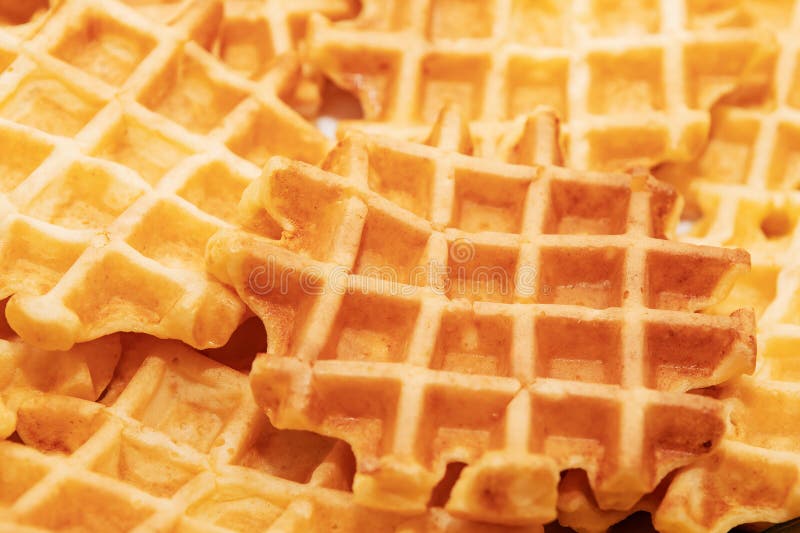Plate of Waffles Featuring a Vibrant Yellow Pattern Stock Photo - Image ...