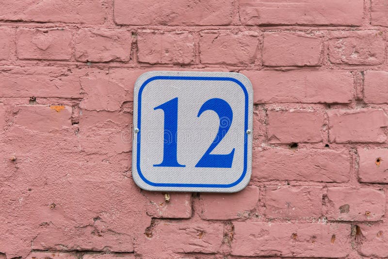12 plate on the wall stock photo. Image of sign, icon - 47047942