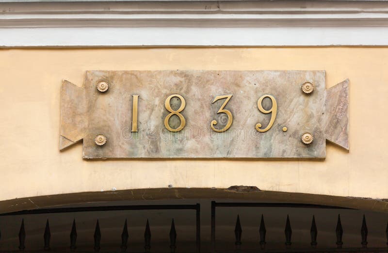 The Plate with the Year 1839 Stock Image - Image of bronze, building ...