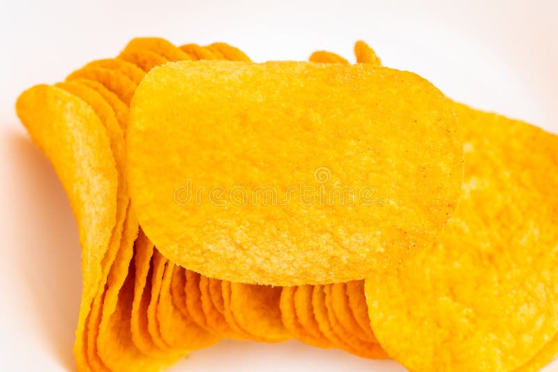 A plate of yellow chips stock photo. Image of delicious - 363794486