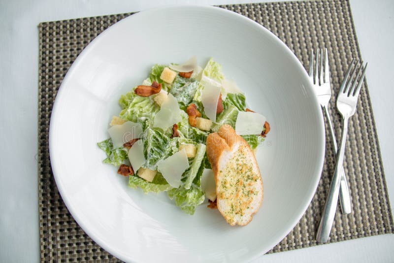 Plated Caesar Salad with Garlic Bread Stock Photo - Image of leaf ...