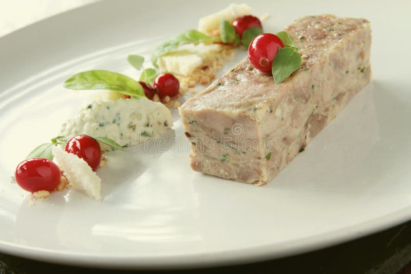 Plated pork terrine starter - Stock Image - Everypixel