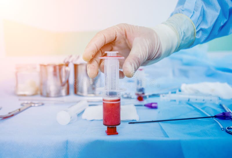 Platelet-Rich Plasma Preparation. Plasma in Syringe. Centrifuge Stock ...