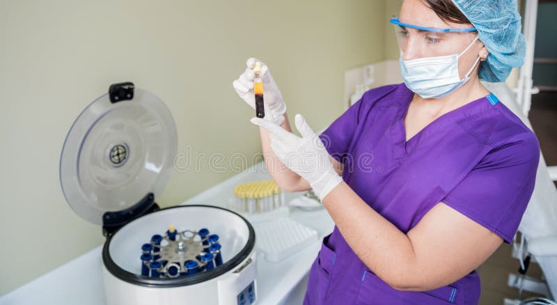 Platelet-Rich Plasma Preparation. Tube with Plasma in Hands Stock Image ...