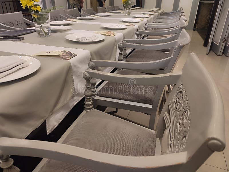 Plates are Arranged on a Long Dining Table Stock Image - Image of wood ...