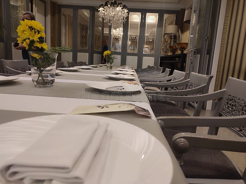 Plates are Arranged on a Long Dining Table Editorial Photography ...