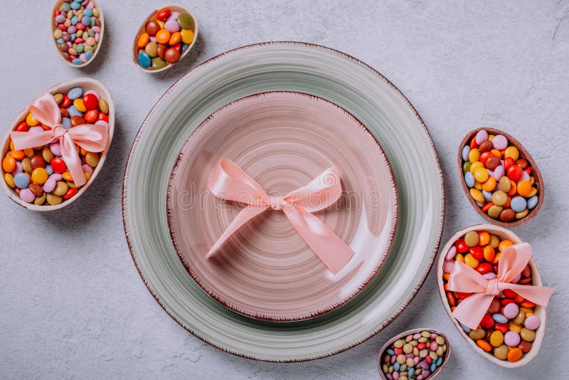 Plates with Easter Chocolate Eggs with Colorful Candies, Table Setting ...