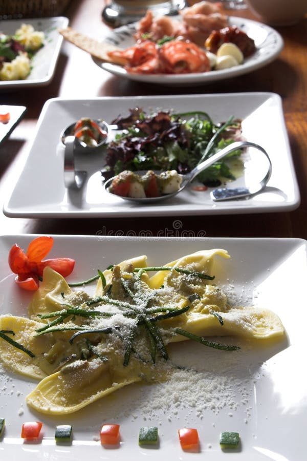 Plates ready to be served stock photo. Image of culinary - 1478836