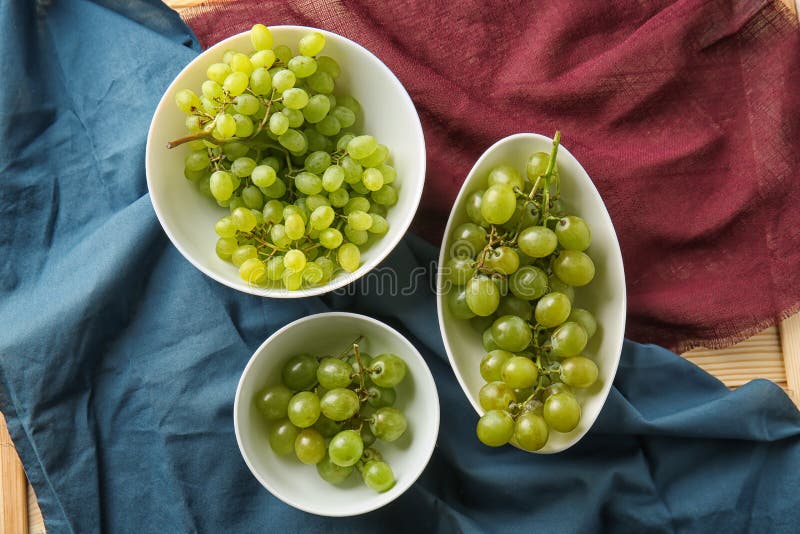 Plates with Ripe Sweet Grapes on Table, Top View Stock Photo - Image of ...