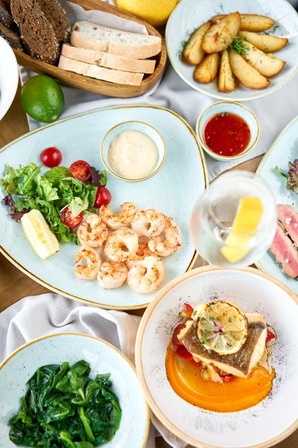 Variety of Dishes on the Table. Various Snacks and Antipasti on the ...