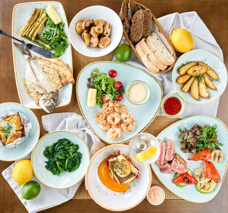 Variety of Dishes on the Table. Various Snacks and Antipasti on the ...