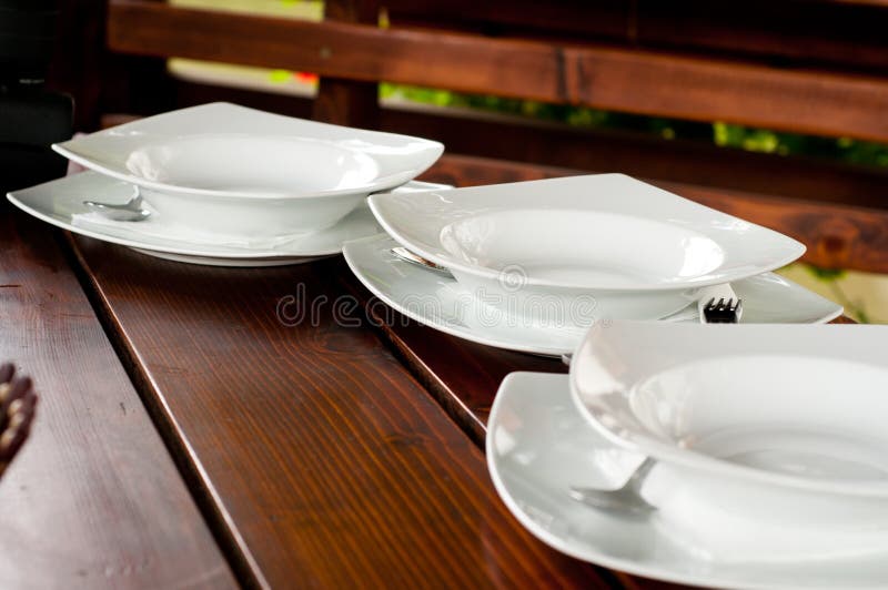Plates on table stock photo. Image of cooking, utensils - 43494552