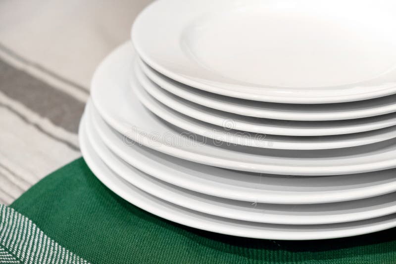 Plates White Empty Stack on Kitchen Table. Close Up Stock Image - Image ...