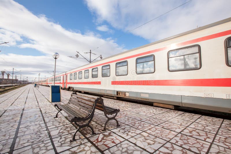 Platform with Bench and Train at the Station Stock Photo - Image of ...