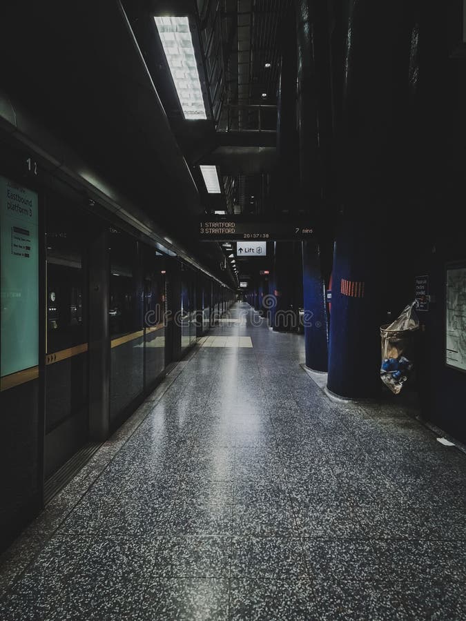 Platform Edge Doors and Signs at a Dark Underground Station in the ...