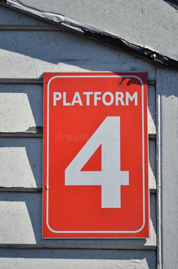 Platform four sign stock image. Image of station, metal - 31475243