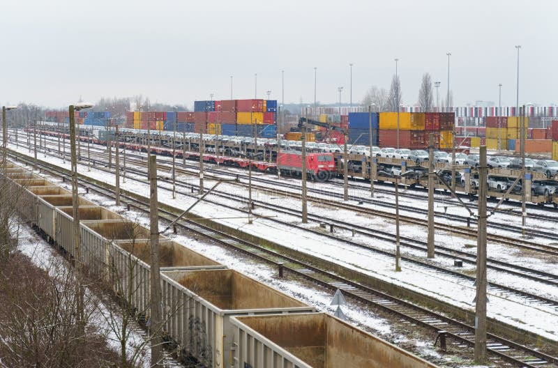On the Platform There are Wagons with Cars, Empty Wagons, Unloaded ...