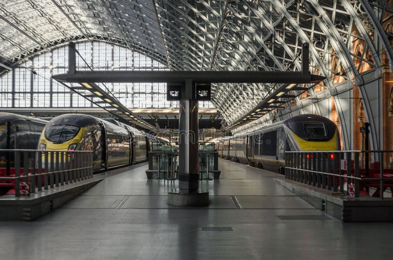 Platform with Trains Parked Inside a Large Station Stock Image - Image ...
