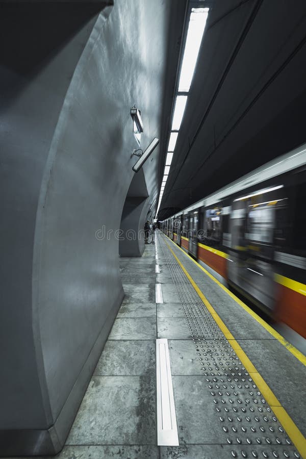 Platform of Underground Station with Passing Train Stock Image - Image ...