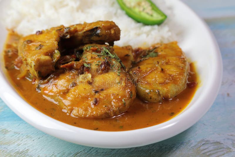 A Platter of North Indian Style Fish Curry with Rice Stock Photo ...