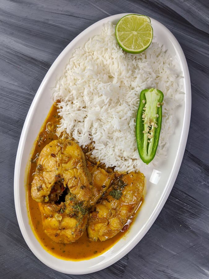 A Platter of North Indian Style Fish Curry with Rice Stock Photo ...
