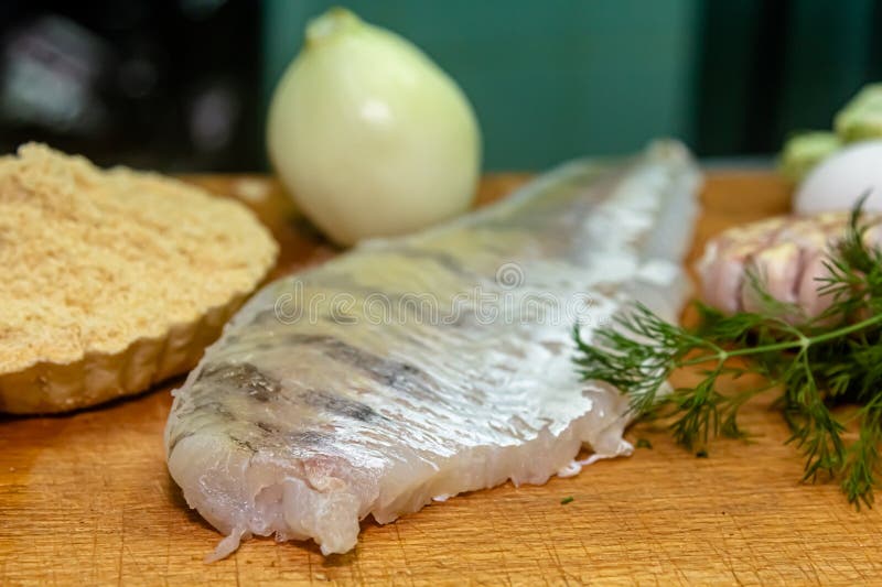 A Platter with Sliced Fresh Fish and Ingredients To Cook it on the ...