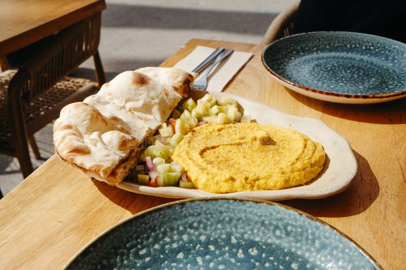 Platter with Curry Hummus and Naan Bread Stock Photo - Image of platter ...
