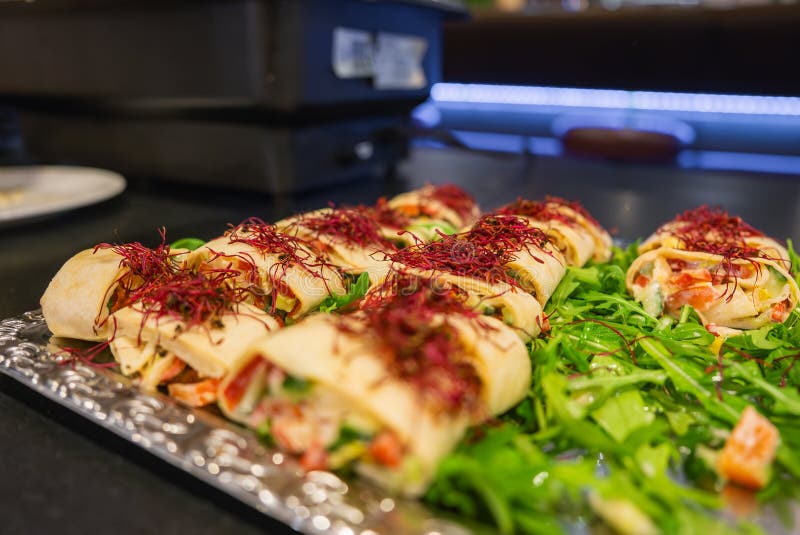 Platter of Vegetable Wraps with Garnish in a Modern Dining Setting ...