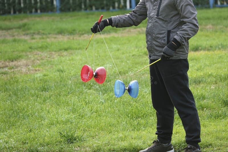 Boy playing diabolo stock image. Image of game, body, juggling - 9208125