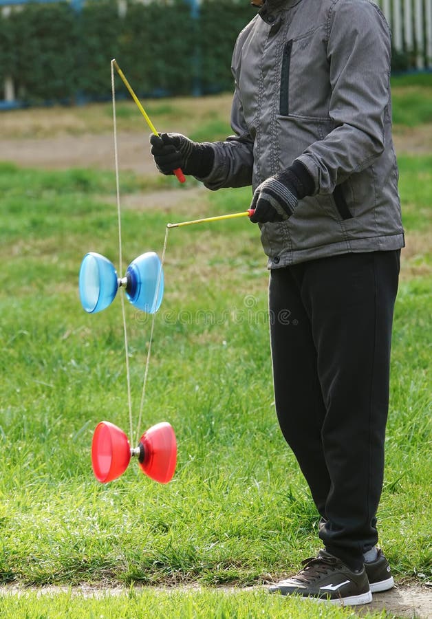 Play diabolo stock photo. Image of people, diabolo, lawn - 79767728
