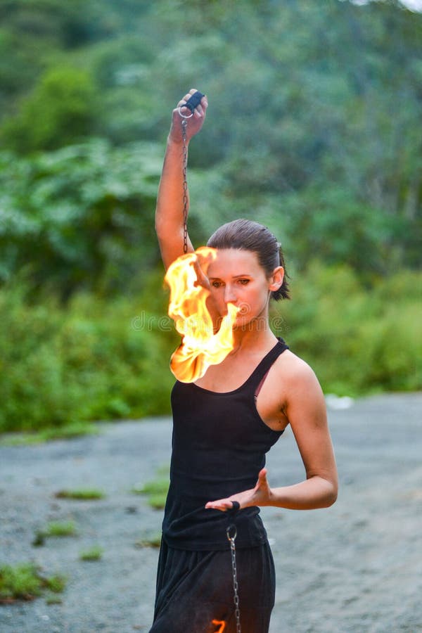 Play with fire show stock image. Image of flame, black - 84222935