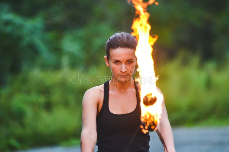 Play with fire show stock image. Image of flame, black - 84222935