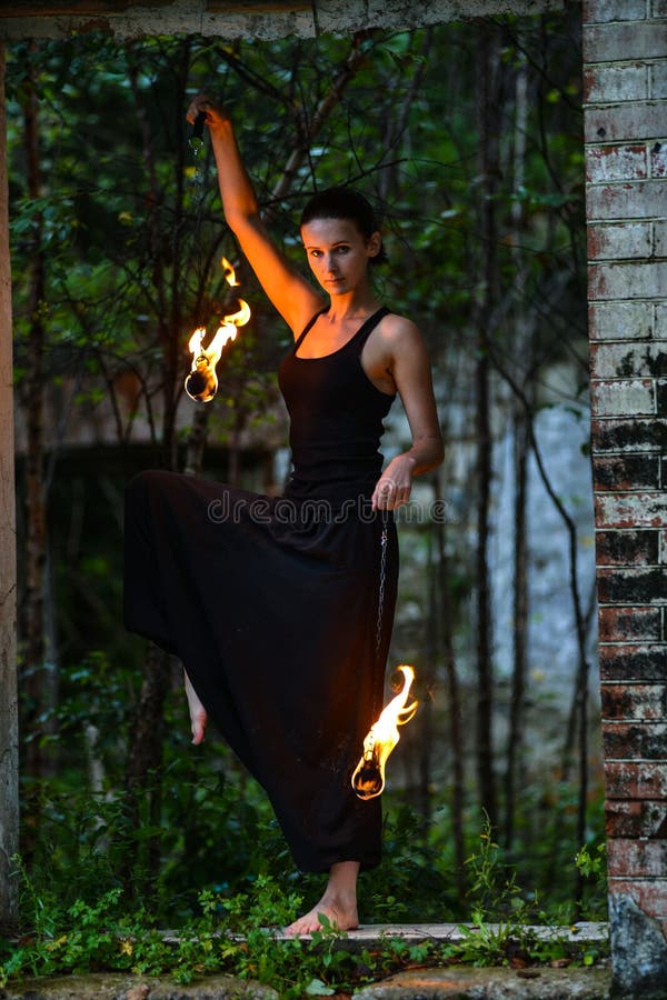 Play with fire show stock photo. Image of girl, dangerous - 84223388