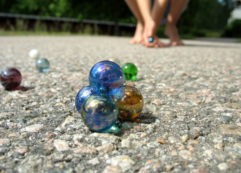 230 Kids Playing Marbles Stock Photos - Free & Royalty-Free Stock ...