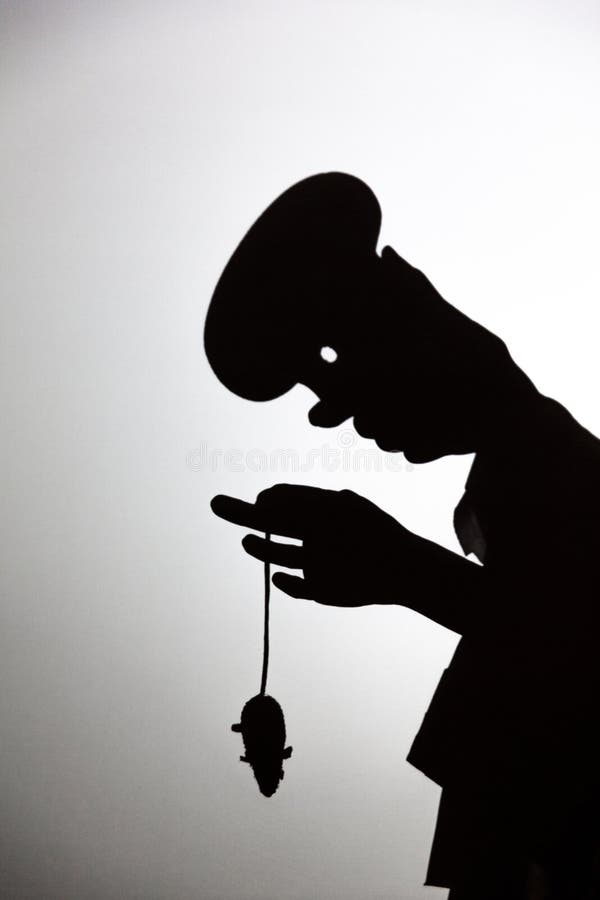 Play Shadow Projected Against a White Background. a Cook and Mouse ...