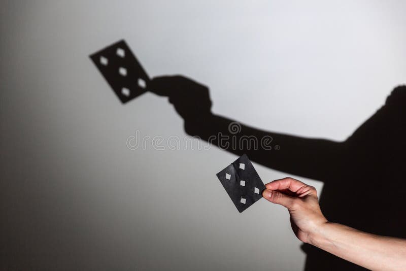 Play Shadow Projected Against a White Background, a Magic Card Trick ...