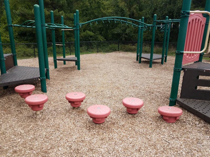 Play Structure with Green Bars and Red Stepping Stones Stock Image ...