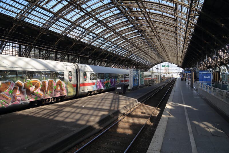 Train on the Covered Platform of the Railway Station in Cologne Germany ...