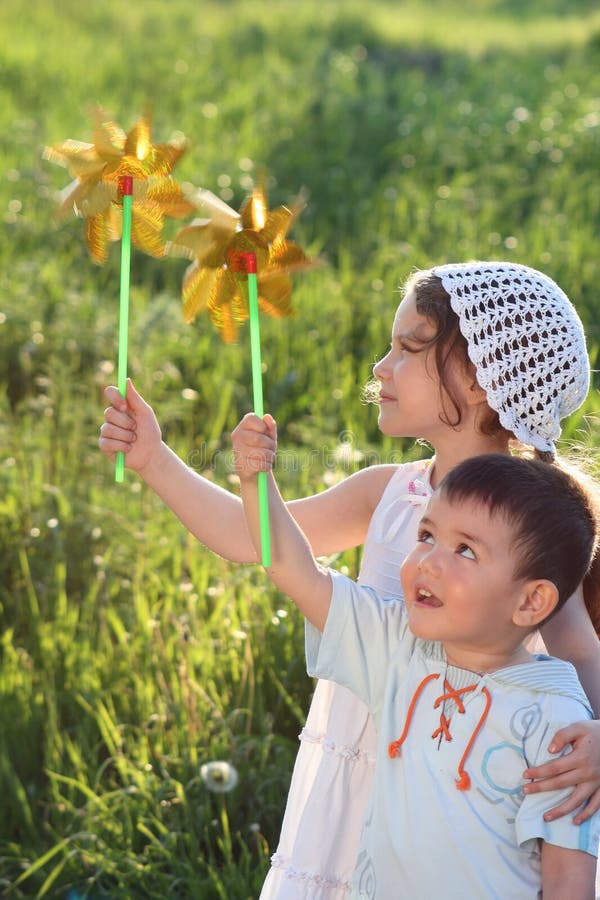 Play with wind stock photo. Image of small, children, rotate - 5722758