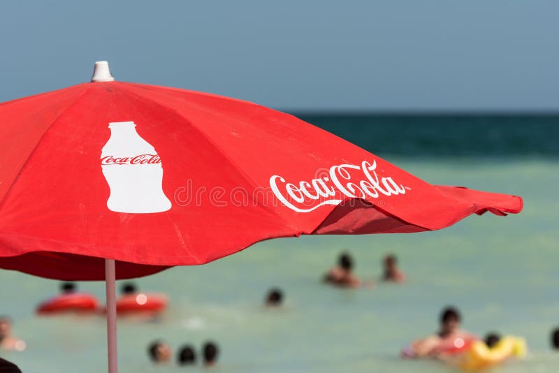 Playa De Coca Cola Umbrella on the Foto de archivo editorial - Imagen ...