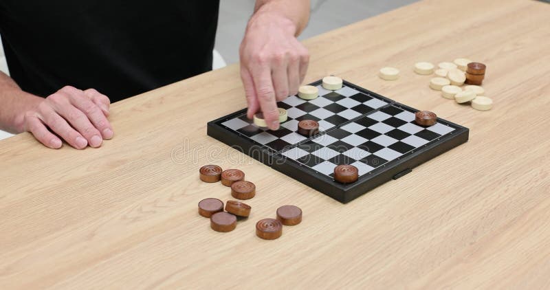 Player Makes Strategic Move in Game of Checkers Stock Video - Video of ...