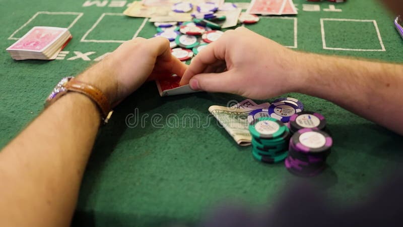 Player Opens Two Aces during Poker Game on Table Stock Footage - Video ...