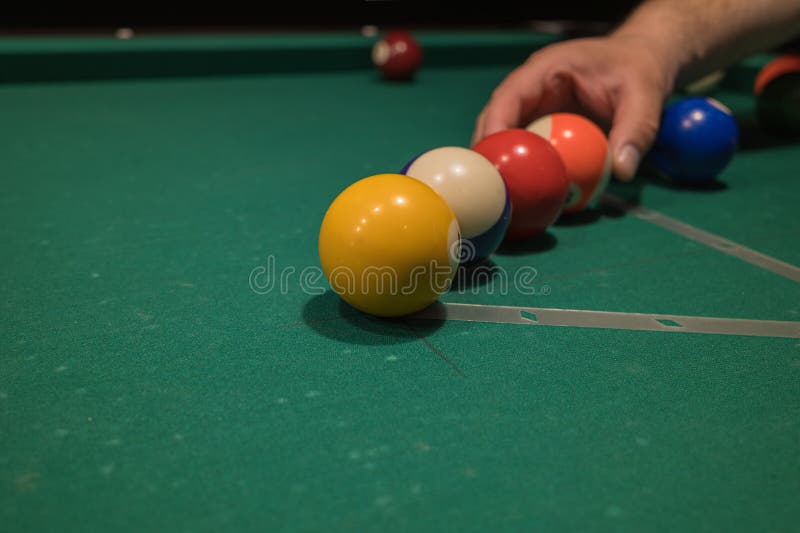 The Player Places the Balls on the Billiard Table. Playing Billiards ...