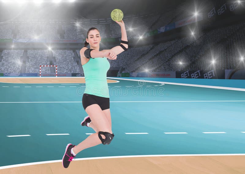 Player Playing Handball in Stadium Stock Image - Image of brunette ...