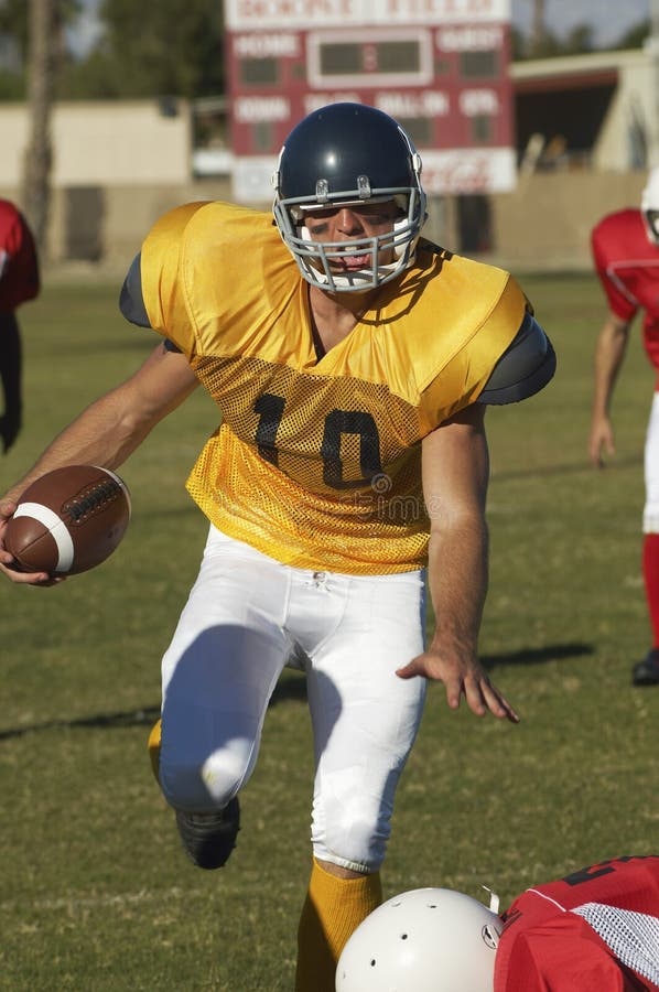 Player Running with Ball on Field Stock Photo - Image of american, male ...