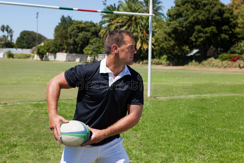 Player Throwing Rugby Ball by Goal Post Stock Image - Image of nature ...