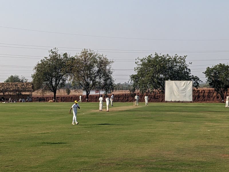 Cricket Ground With Players