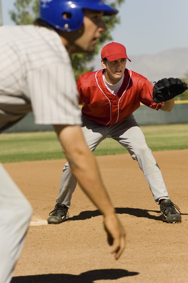Player Holding Baseball Bat Stock Image - Image of outdoors, player ...